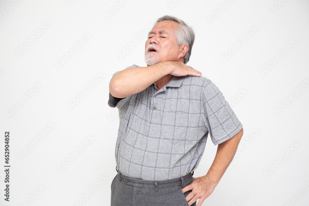 Asian senior man with shoulder pain isolated on white background ...