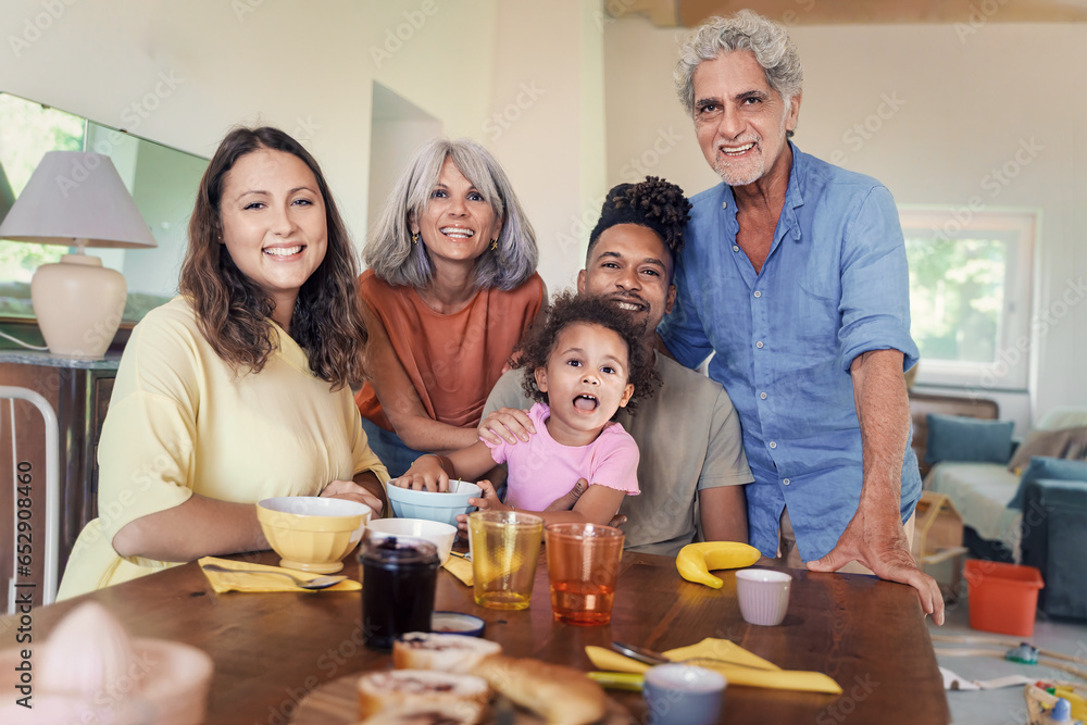 Multi-generational Family Portrait in Kitchen - Cheerful extended family, including grandparents ...