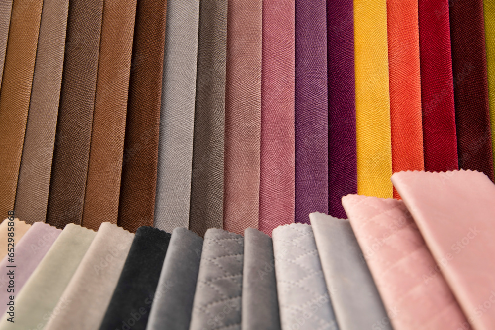 Fabrics in form of a catalog, samples of fabrics of different colors ...
