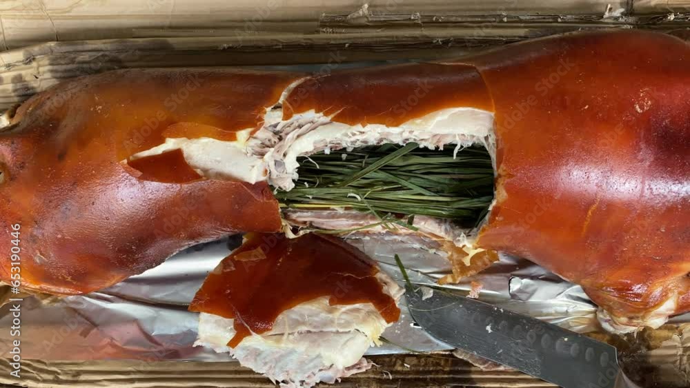 Lechon is a traditional Filipino dish. Whole roasted pig with crispy ...