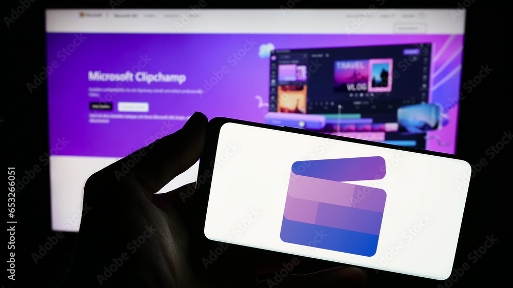 Stuttgart, Germany - 09-22-2023: Person holding smartphone with logo of video editing software ...