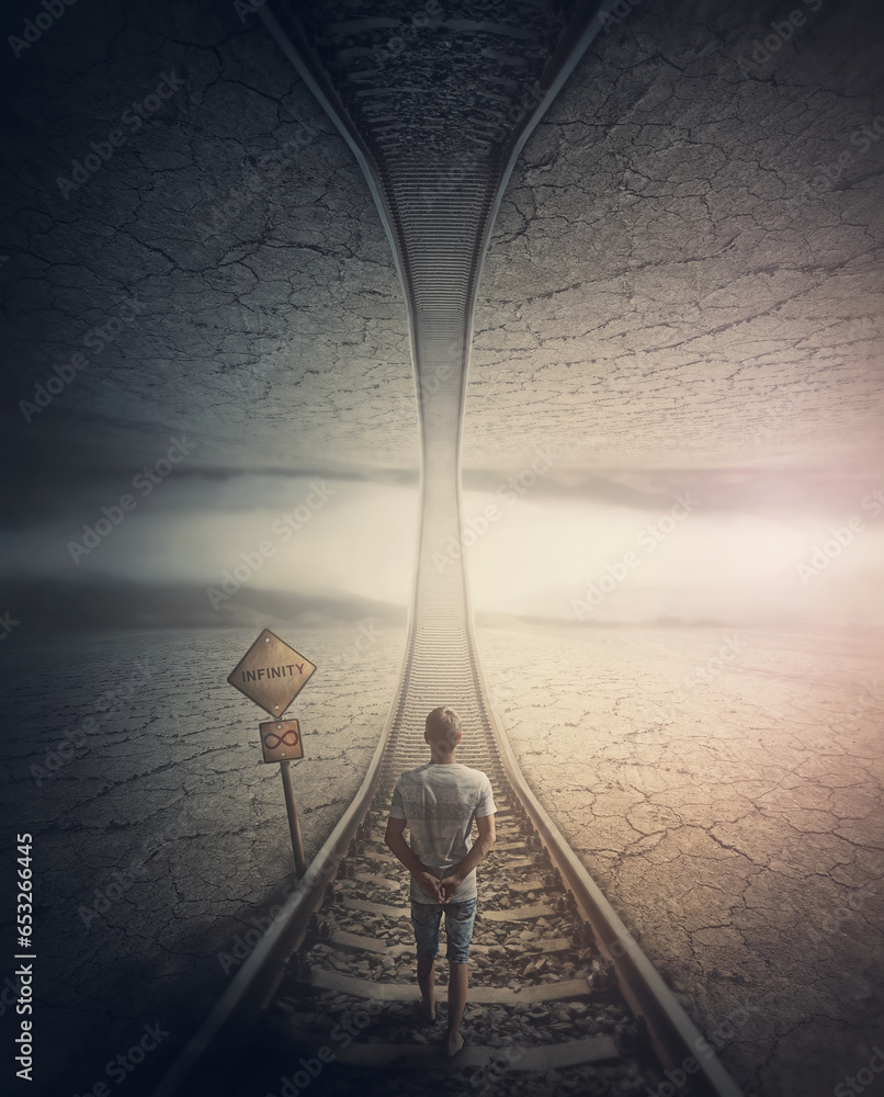 Infinity road concept with a man walking the railway to the parallel ...