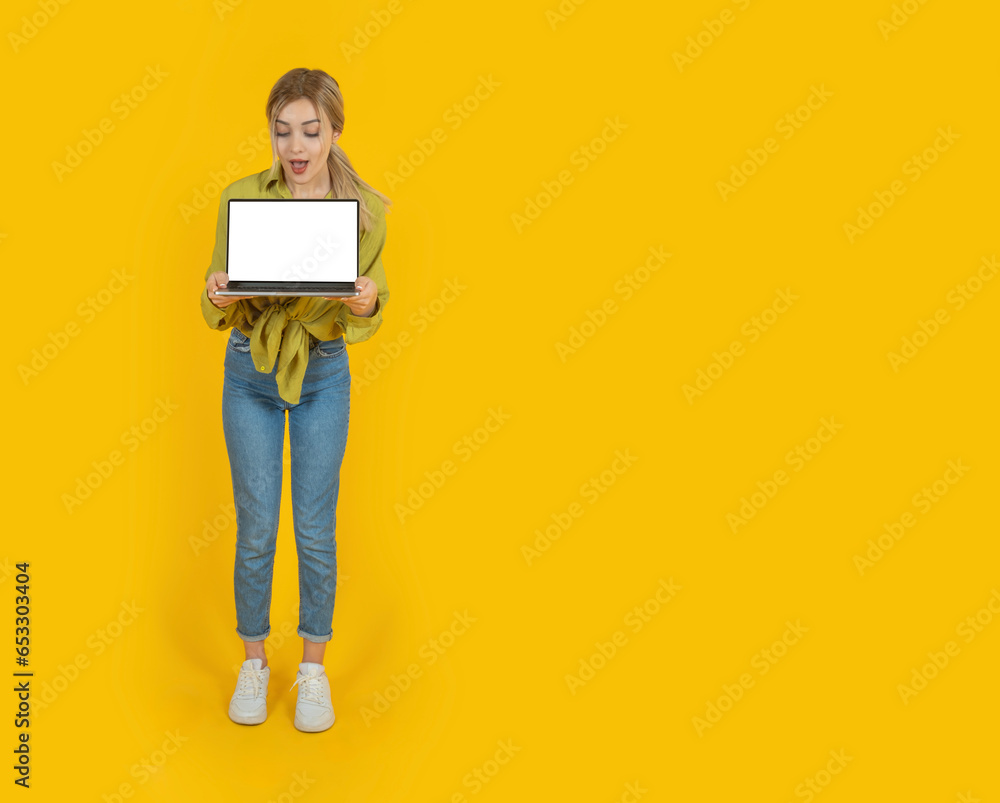 Full body view of young blonde caucasian girl holding showing empty ...