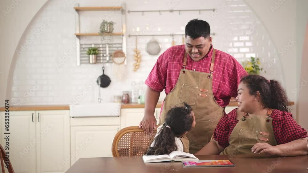 A plus-size family with a father wearing a prosthetic leg, is happily ...