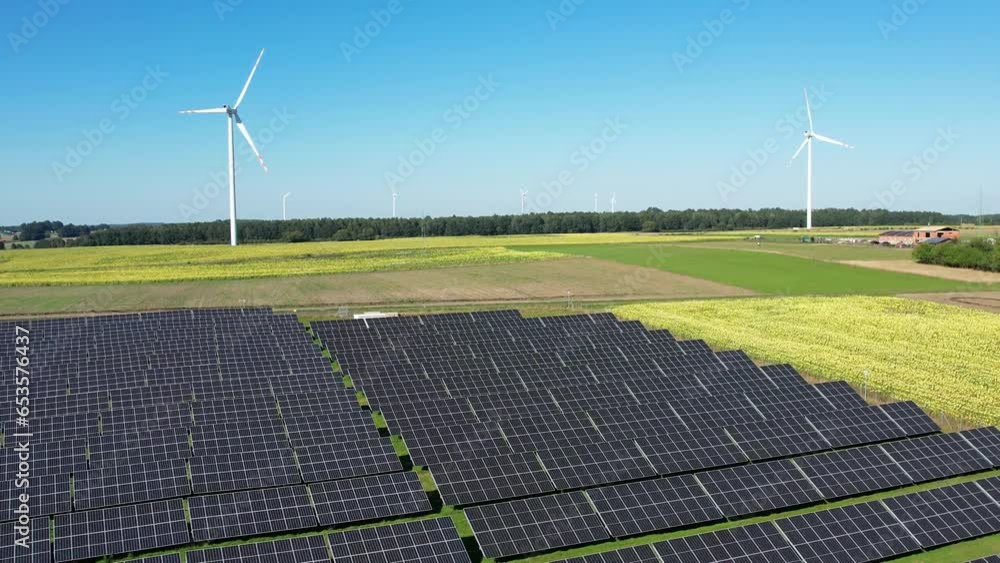 Solar Farm and wind turbines aerial view. Solar energy panels ...