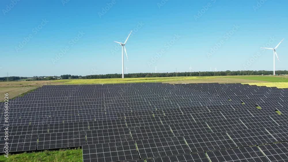 Solar Farm and wind turbines aerial view. Solar energy panels ...