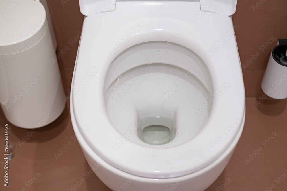 flushing water in toilet to demonstrate personal hygiene act, process ...