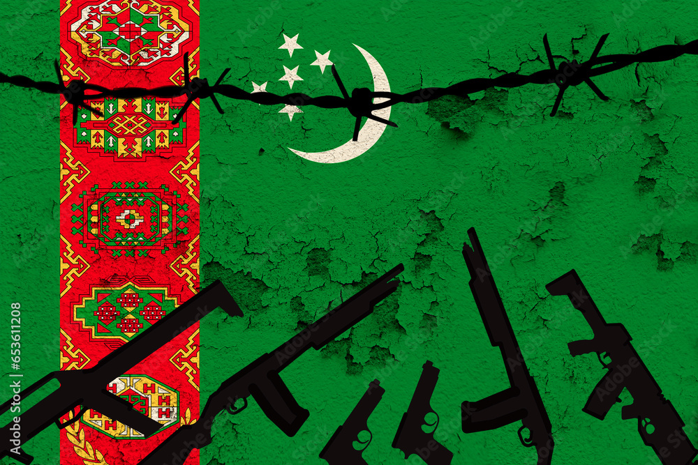 national flag of turkmenistan on textured background, rows of barbed ...