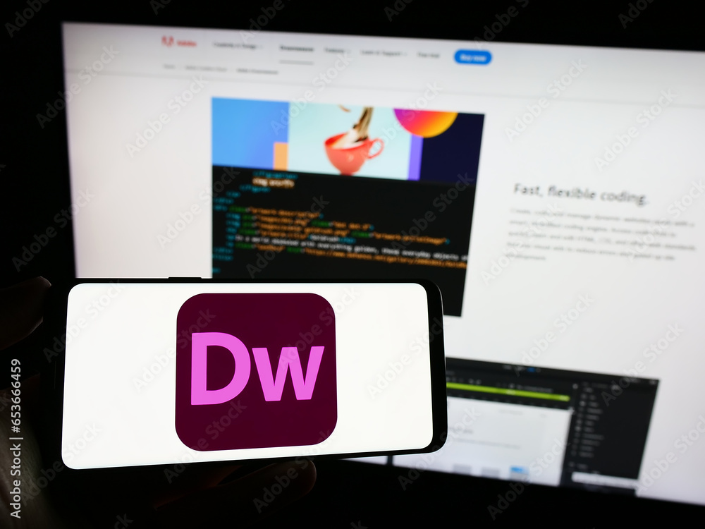 Stuttgart, Germany - 09-23-2023: Person holding mobile phone with logo ...