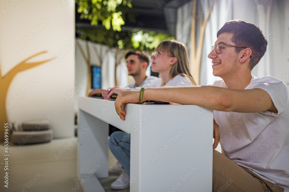 Students at a Quiz Competition with Hands on a Button Stock Photo ...