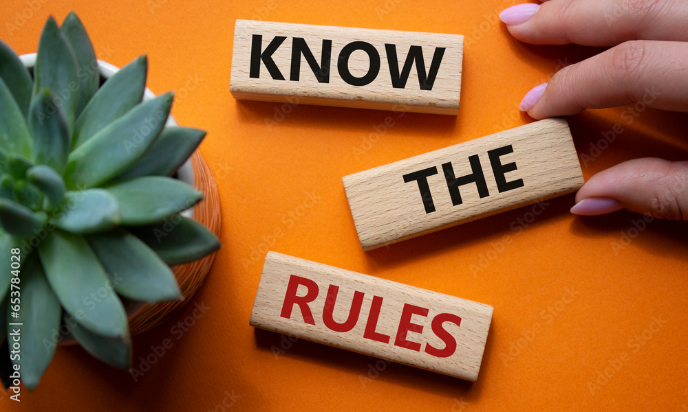 Know the rules symbol. Wooden blocks with words Know the rules ...