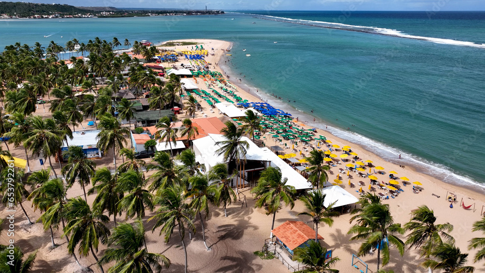 Aerial panning shoot of turquoise water beach at Maceio Alagoas Brazil ...