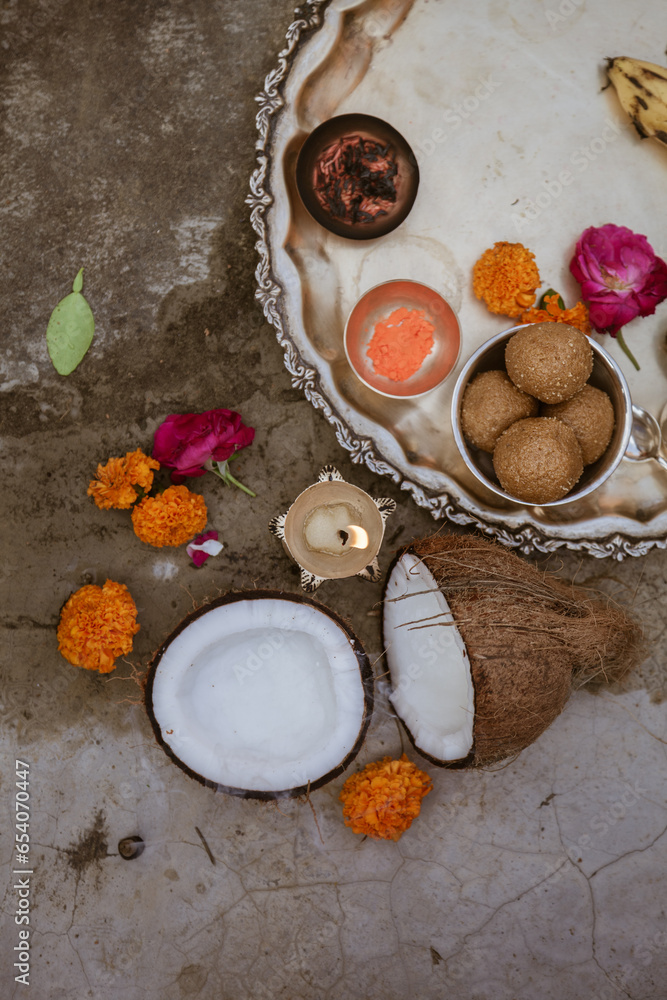 Indian Traditional Pooja ritual with fresh flowers, coconut, kumkum ...