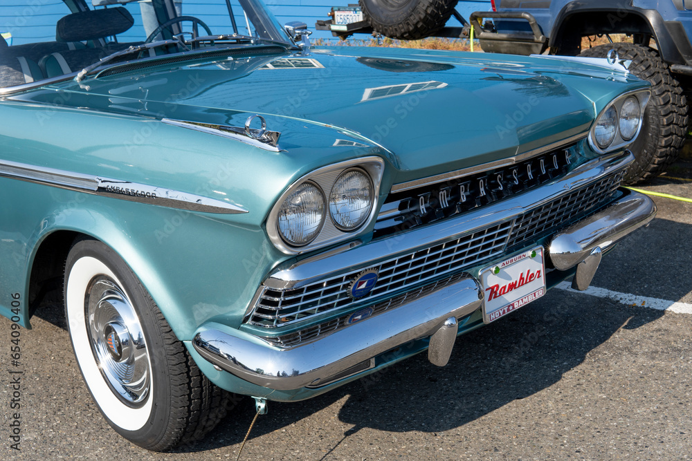 Snohomish, WA, USA - 25 September 2022. Headlights of blue AMC Rambler ...