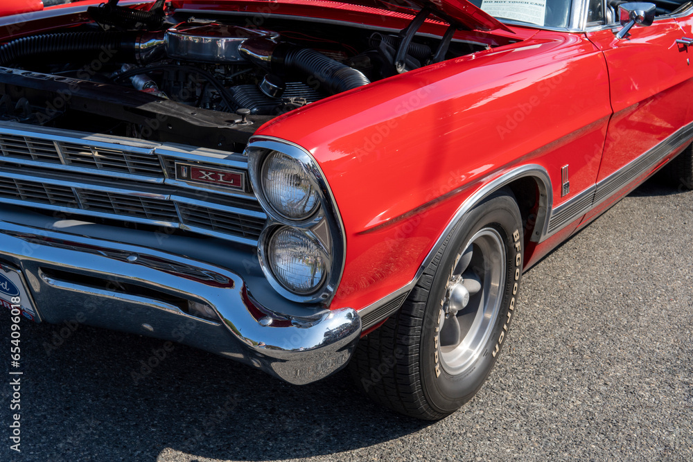 Snohomish, WA, USA - 25 September 2022. Headlights of red Ford Galaxie ...