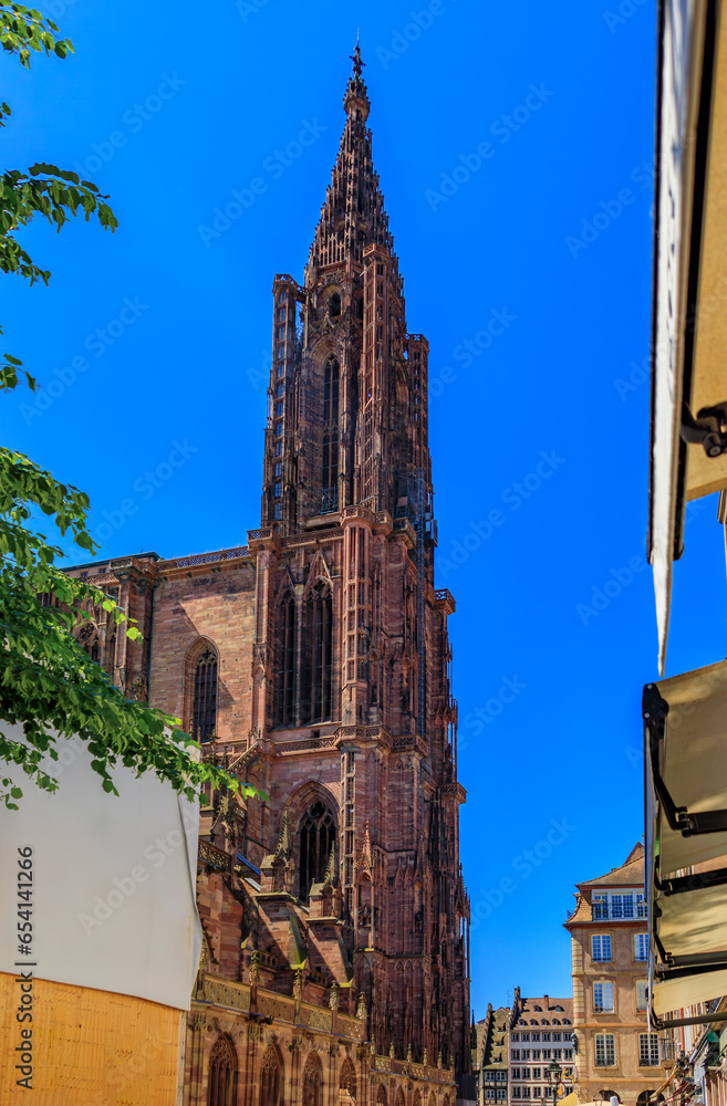 Poster Facade and the spire of Notre Dame Cathedral and ornate ...