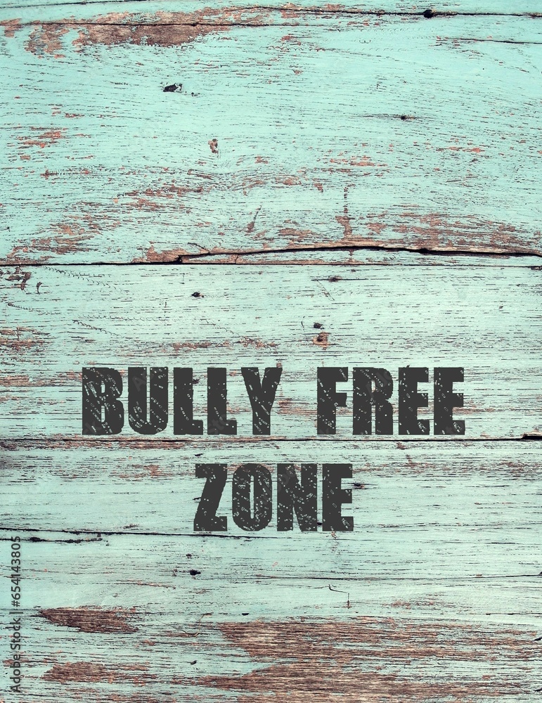 Blue old wood wall copy space background with text BULLY-FREE ZONE ...