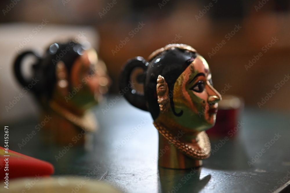 coloring of Goddess face. Hindu Goddess making statue. Face coloring ...