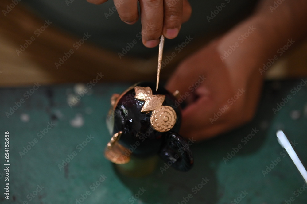 coloring of Goddess face. Hindu Goddess making statue. Face coloring ...