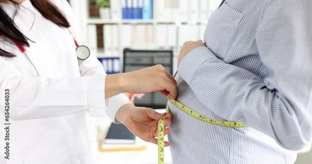 Gynecologist measures abdominal circumference with centimeter. Belly ...