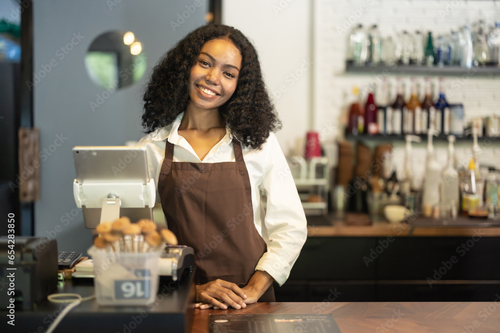 Small biz owner and barista manage shop's daily routine. Open, serve ...