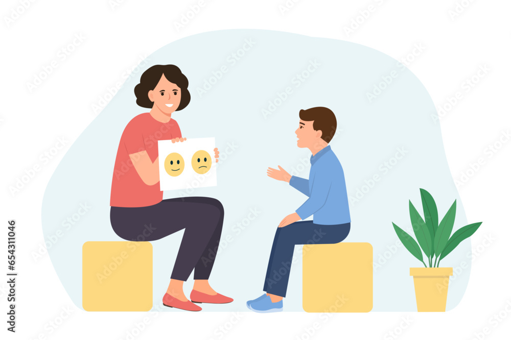 Child psychologist showing pictures to the boy. Family psychotherapy ...