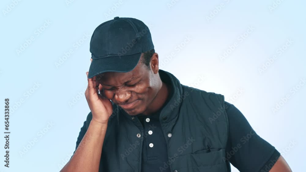 Stress, headache and black man studio for delivery with pain, fatigue ...