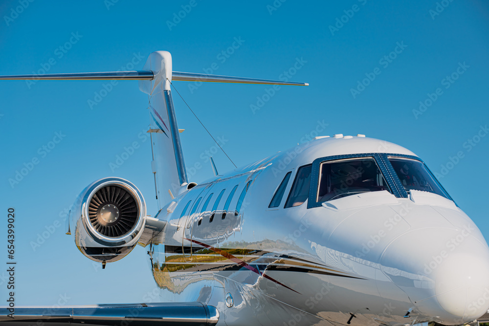 Small corporate jet as seen from the side. Fuselage, wings, tail-fin ...