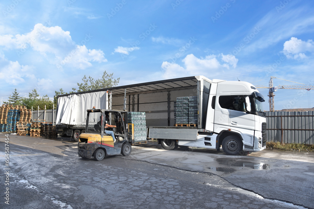 Poster forklift, white truck loading and unloading – Wall Art | UkPosters