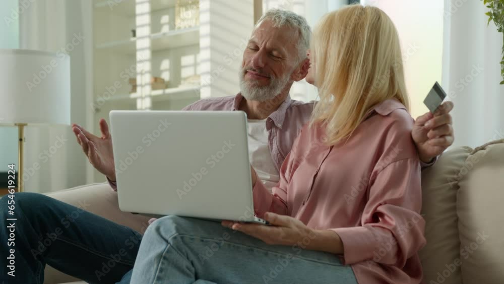 Happy elderly married couple man woman customers hugging making ...