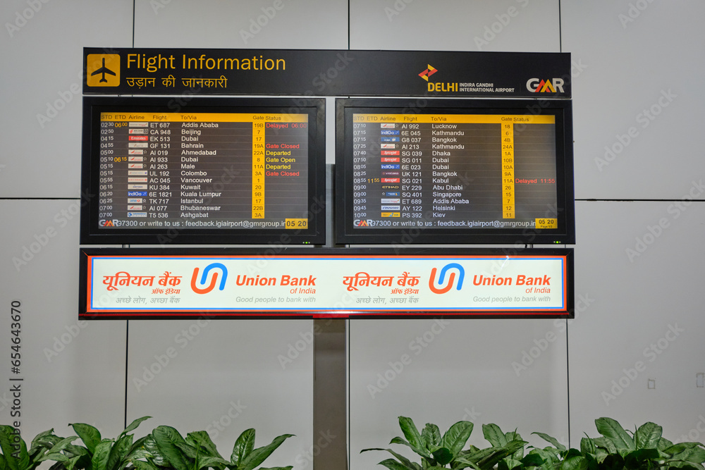 Flight information display board at Indira Gandhi International Airport ...