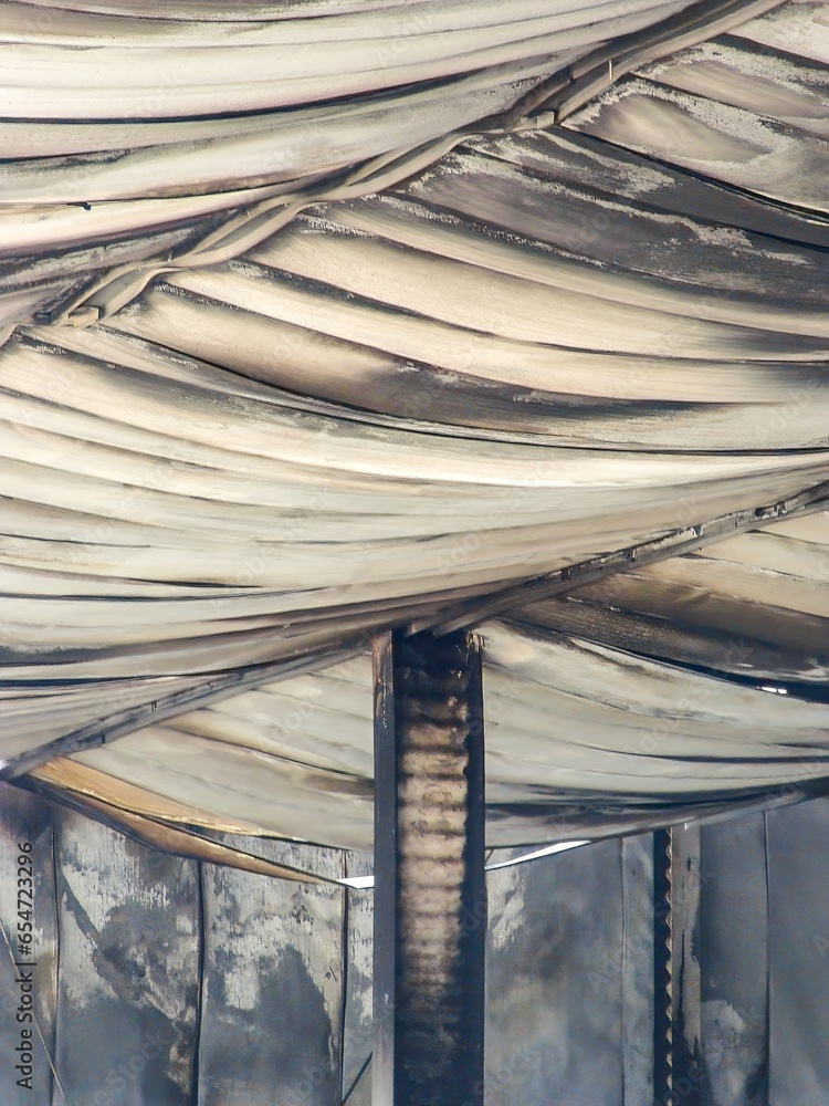The warehouse after the fire. The metal frame of the building burned ...