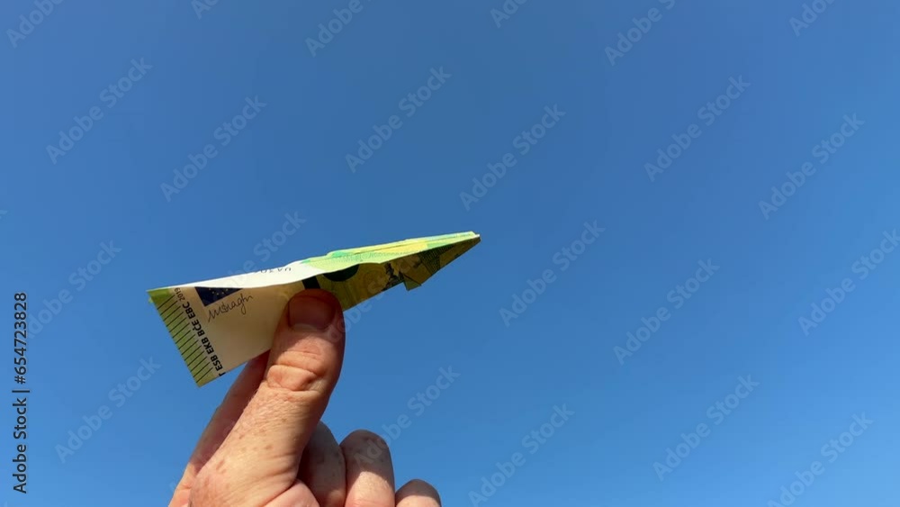 Vidéo Stock Euro note as paper airplane. 100 euros Banknote in form of ...