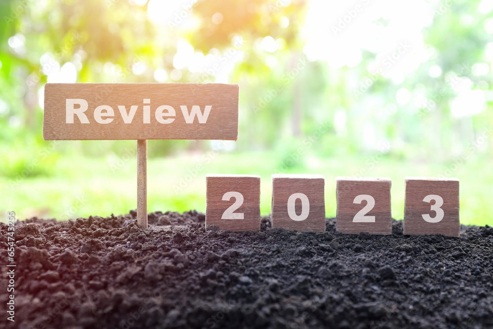 Year 2023 review concept. Wooden blocks typography in natural ...