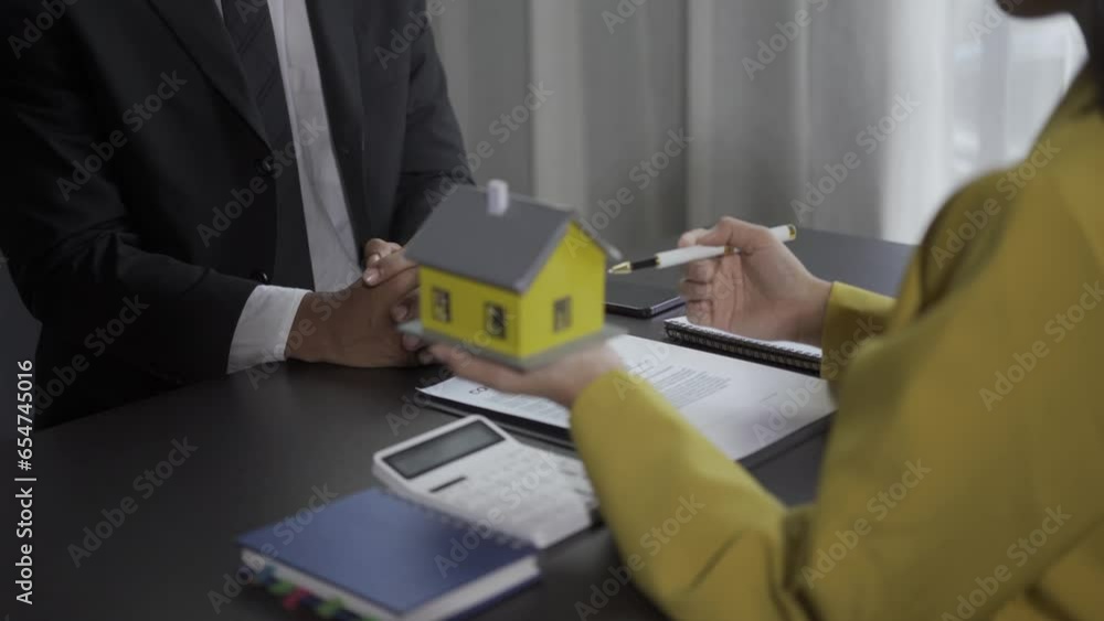 Real estate agents offer price lists and conditions for buying houses ...