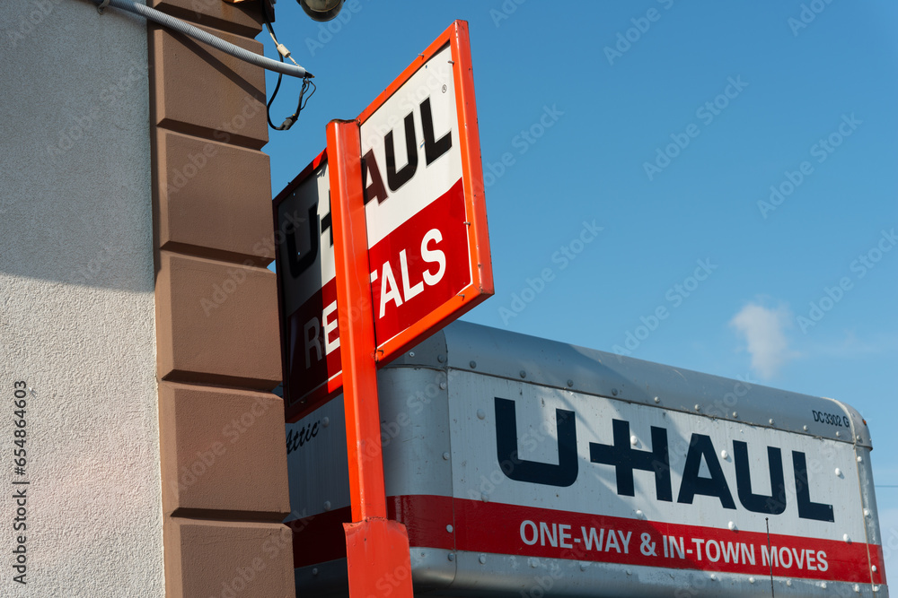 U-Haul Rental location, with old signage and moving truck parked near a ...