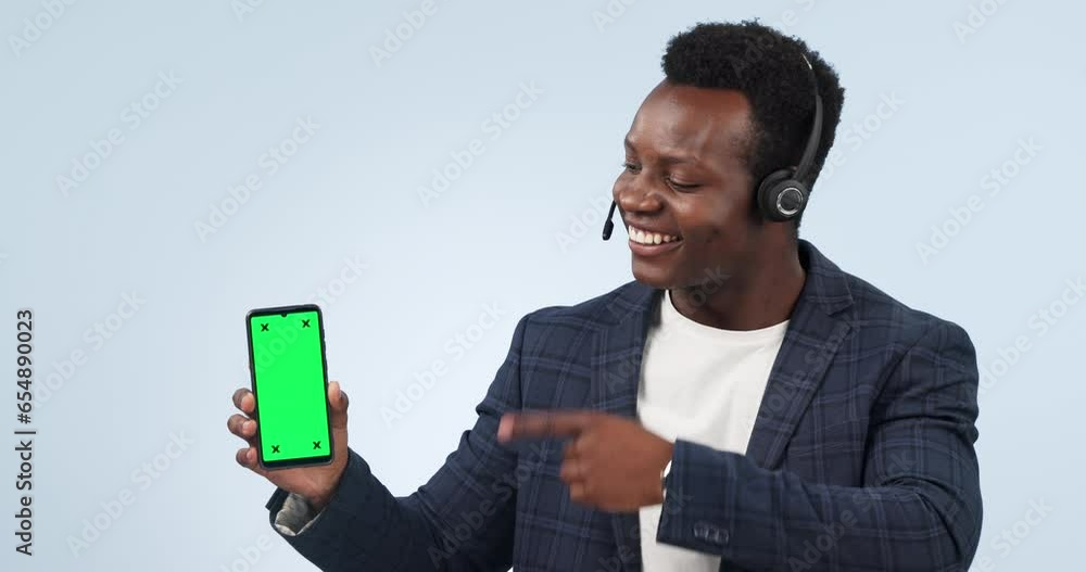 Black man, call center and pointing to phone green screen in ...