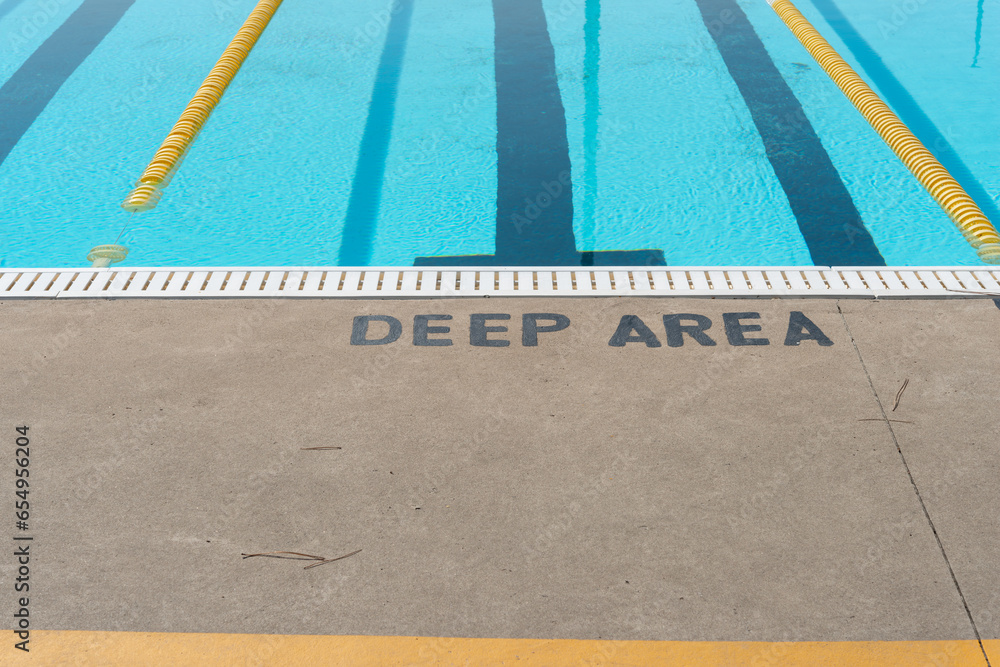local municipal public pool with "deep area" and lane lines Stock Photo ...