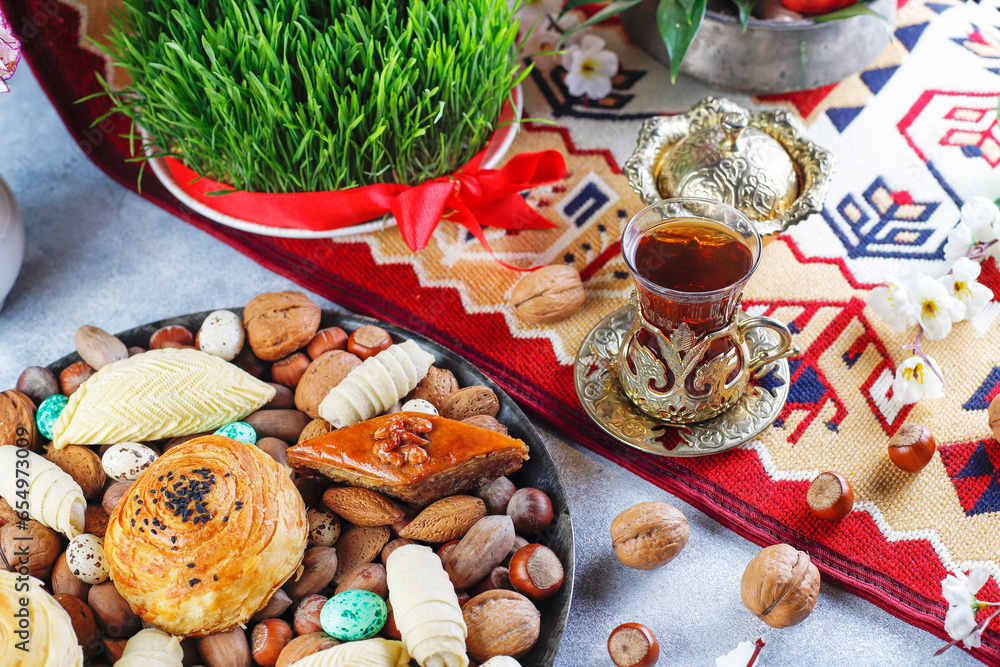 Traditional Azerbaijan holiday Novruz background with green semeni ...