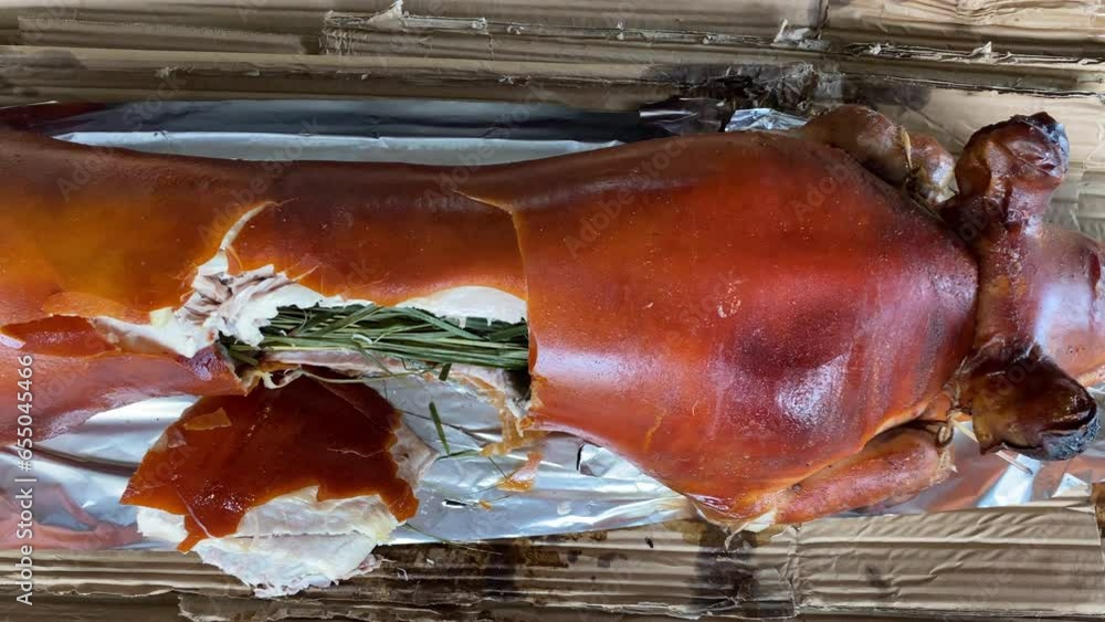 Lechon is a traditional Filipino dish. Whole roasted pig with crispy ...