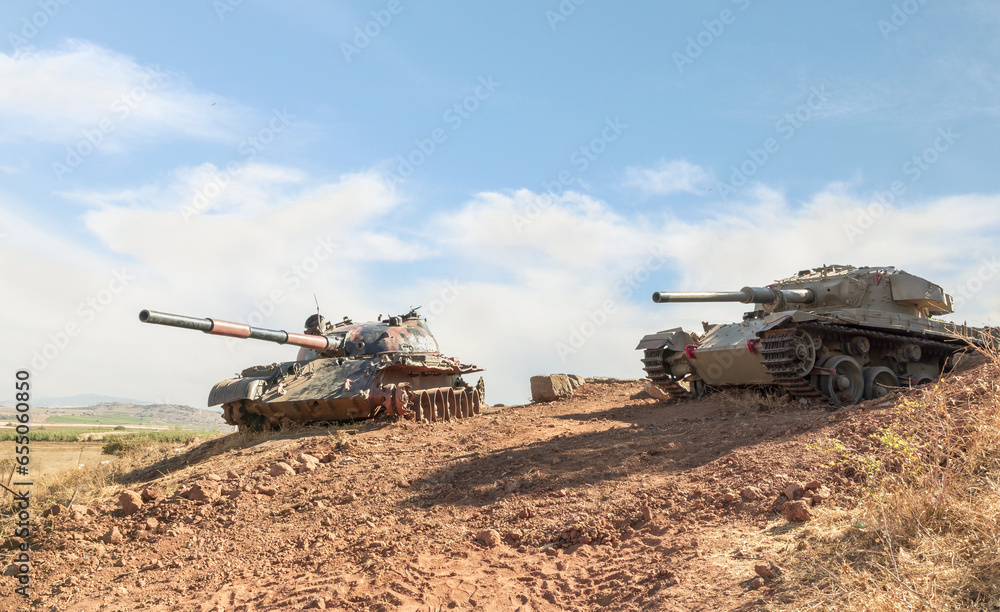 Syrian and Israeli tanks destroyed during the Yom Kippur War are in the ...