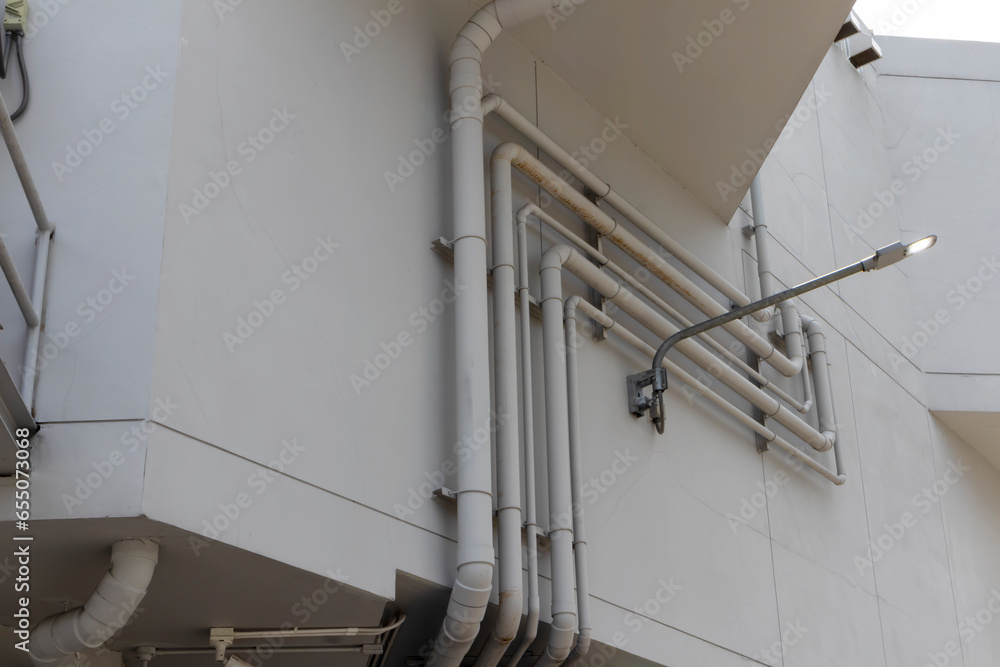 Outside the building, bile and sewerage system pipes are installed ...