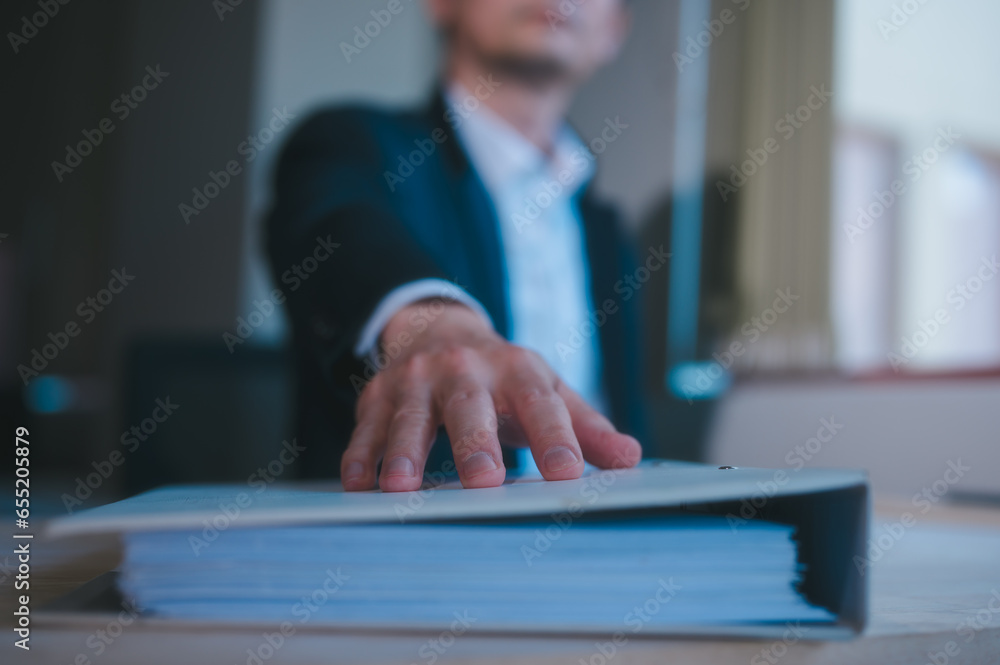 businessman hand passing files folder or handing over document ...
