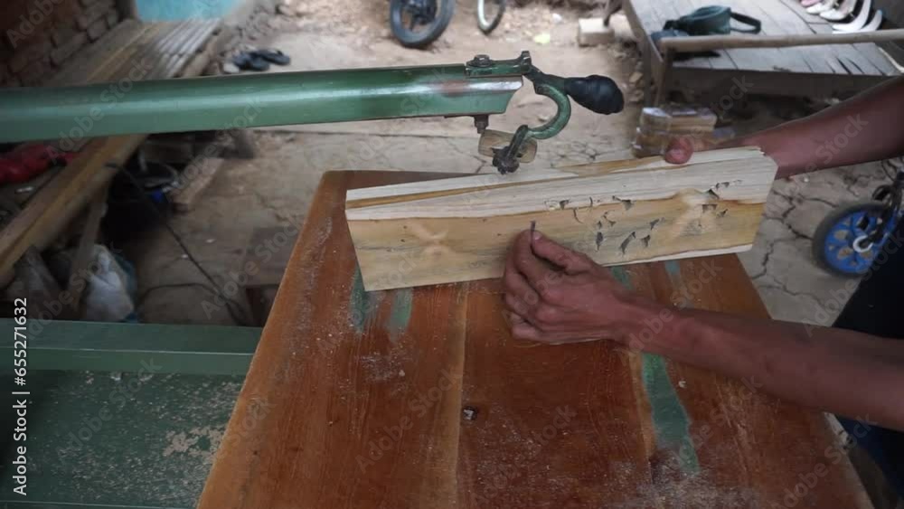 The initial process of making traditional Javanese Gebyok is made from ...