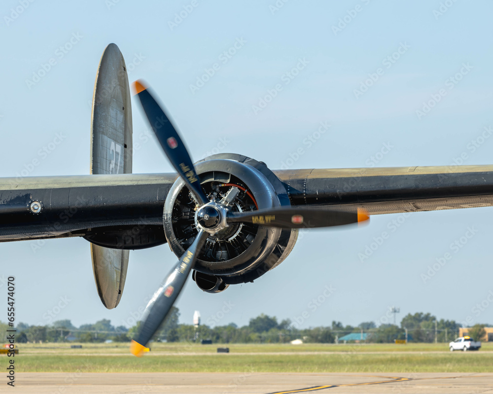 B-24 liberator radial engine turning over while getting ready to start ...
