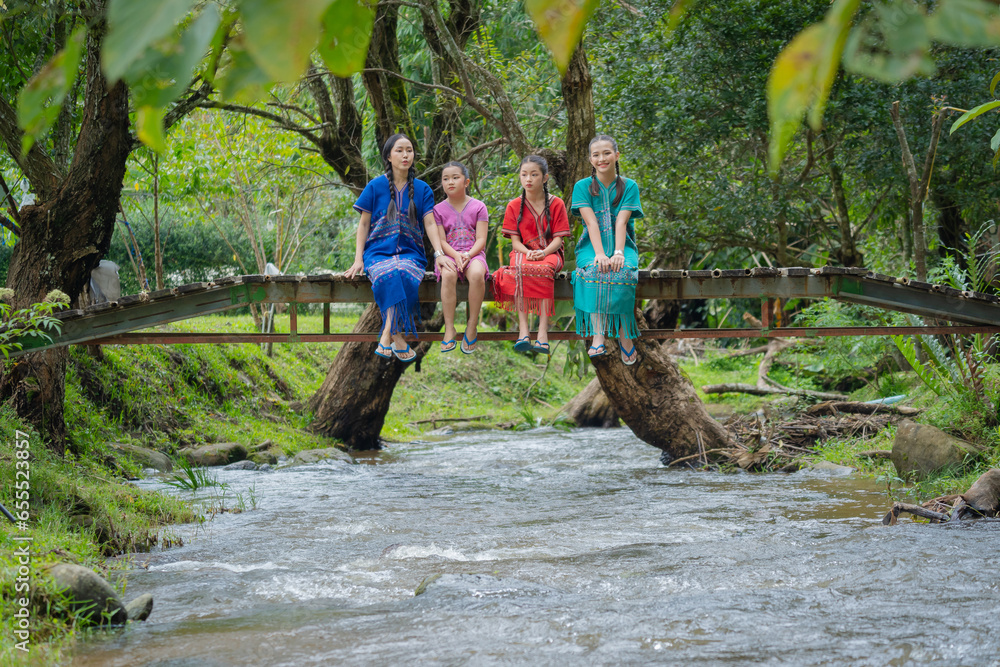 Asian traveler teenage girls group wearing Karen dresses are happy and ...