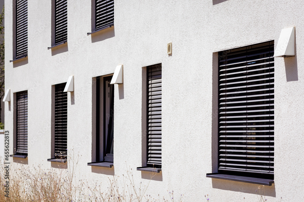 Roller Blinds on Windows Outside. External Shutters Window of Modern ...
