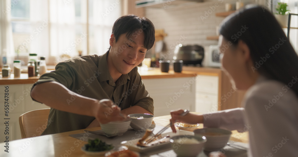 Young Loving South Korean Couple Eating Homemade Tasty Food at Home and ...