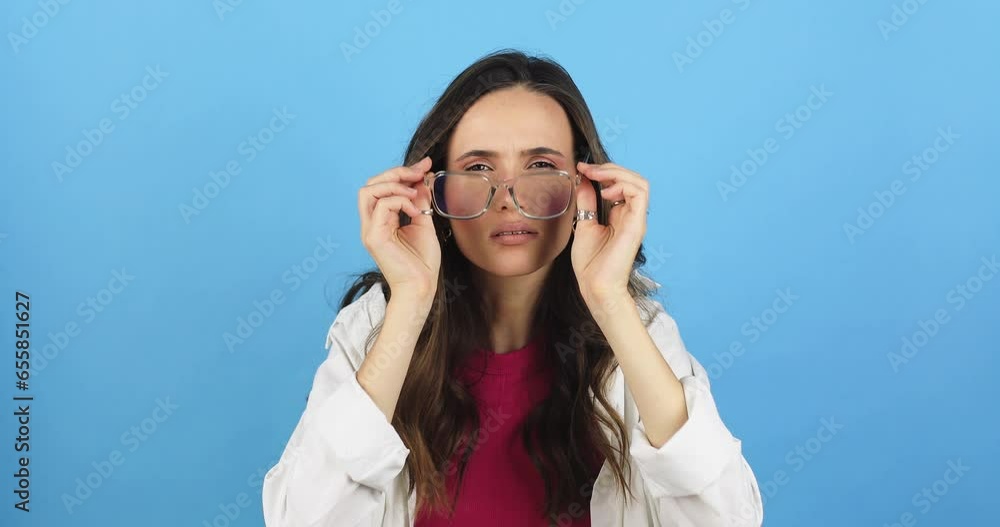 Girl with poor vision looking at camera and rejoicing after putting on ...