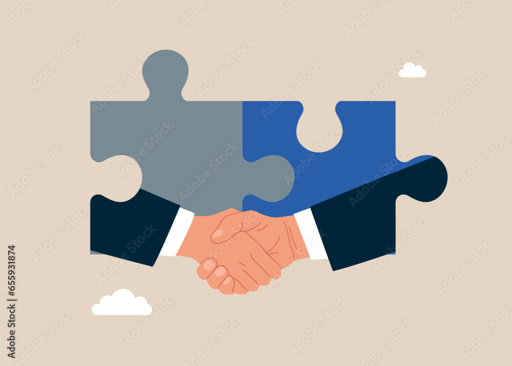 Finish deal and handshake on jigsaw puzzle. Teamwork support each other ...